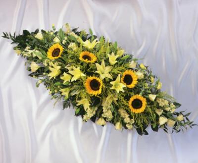 Casket Spray in yellow, cream and green | Brodies Blooms and Gifts